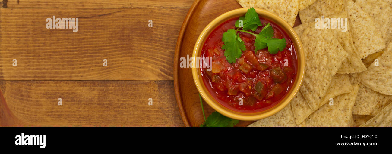 Spicy Red Salsa with tortilla chips Stock Photo - Alamy