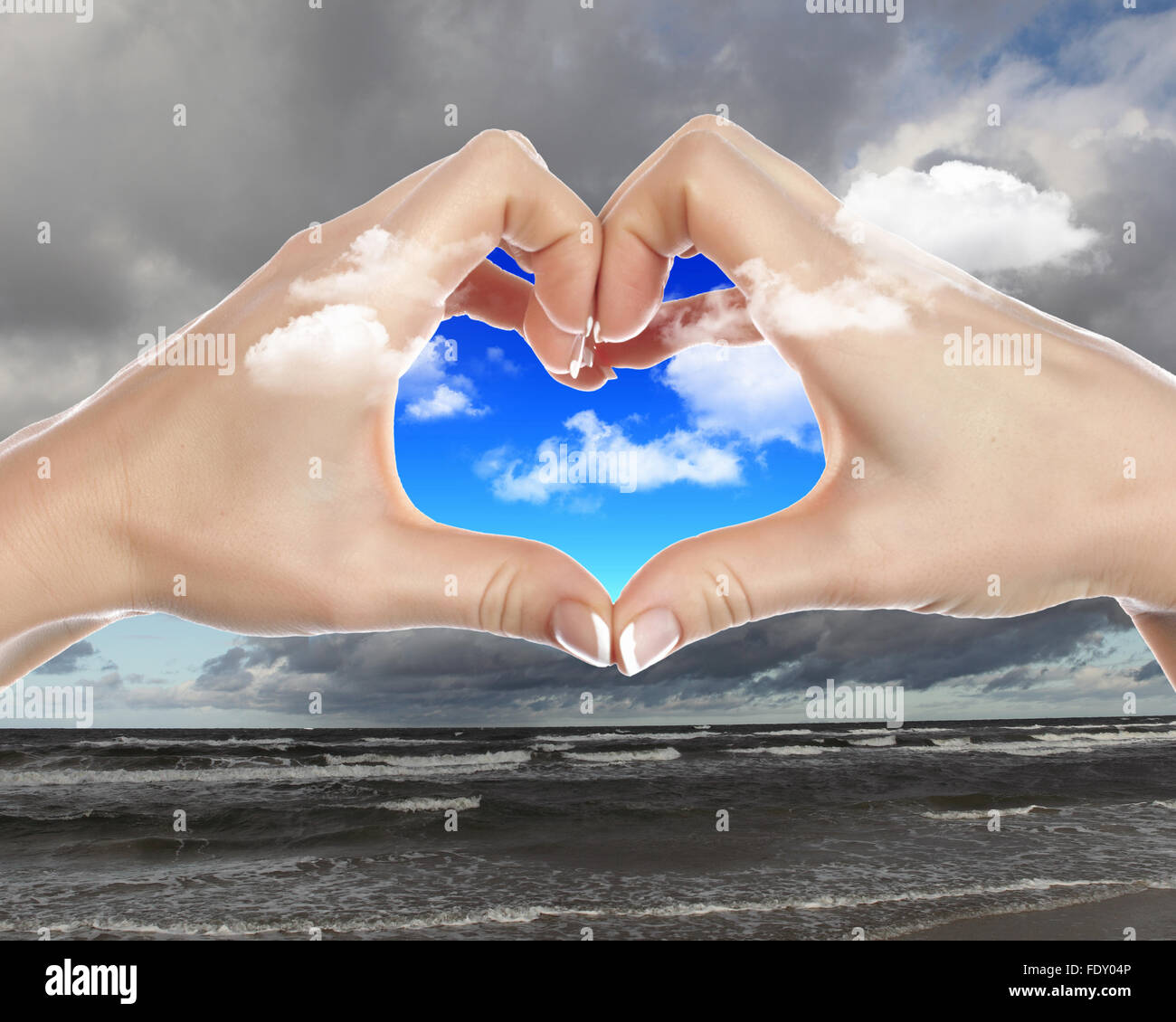 Collage with hands and blue cloudy sky Stock Photo - Alamy