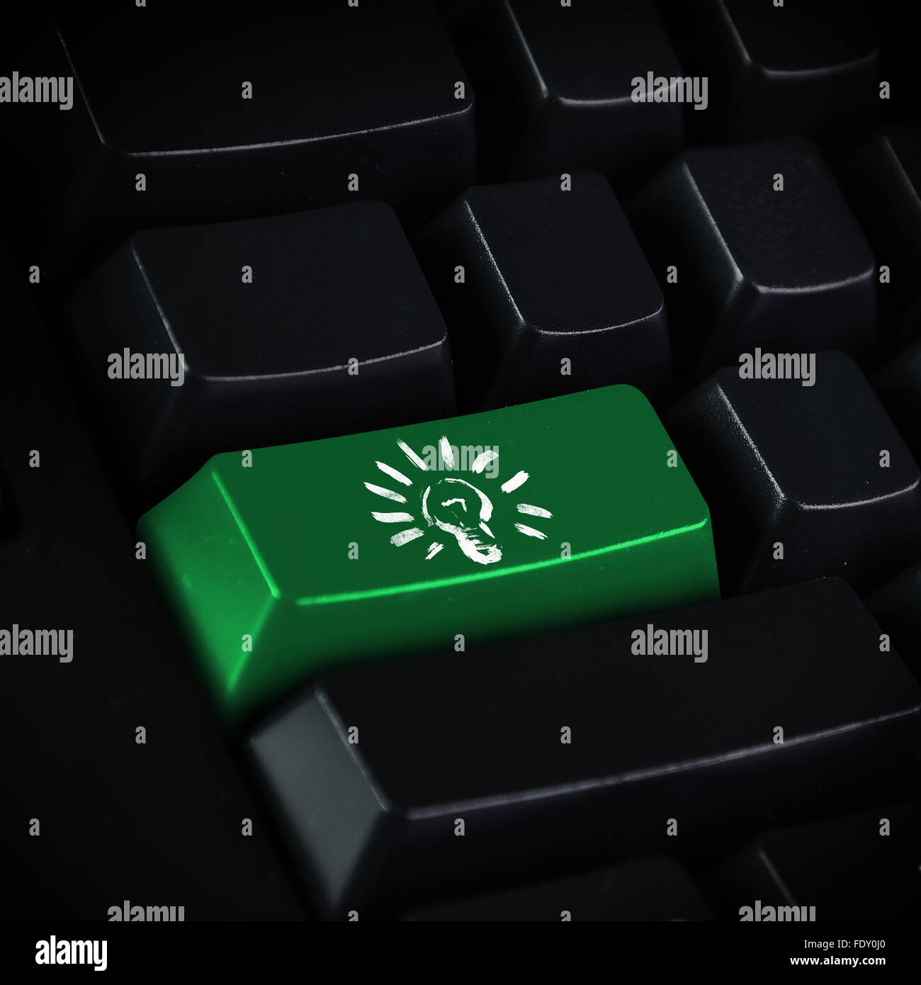 Computer keyboard with light bulb symbol on it Stock Photo - Alamy