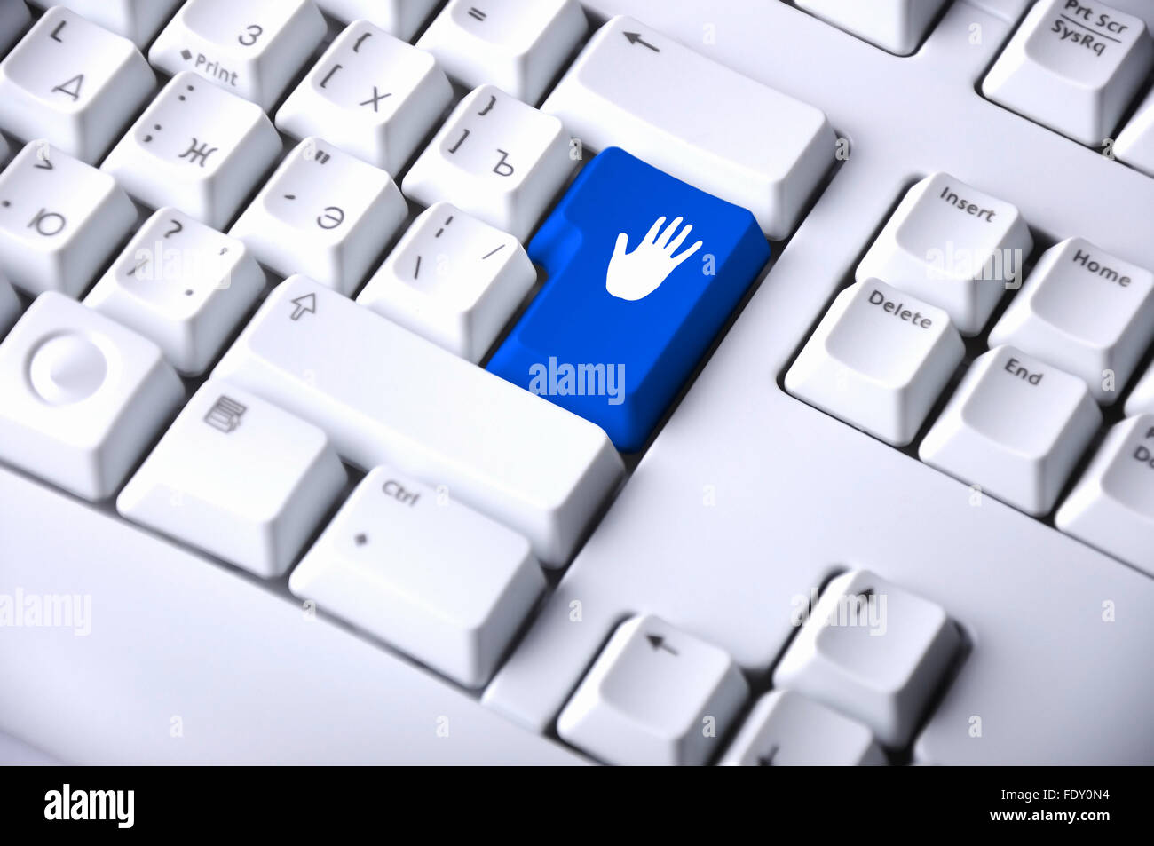 Computer keyboard with stop sign on it Stock Photo - Alamy