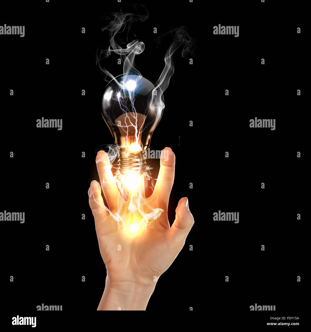 human hand, electric charge and light bulb Stock Photo - Alamy