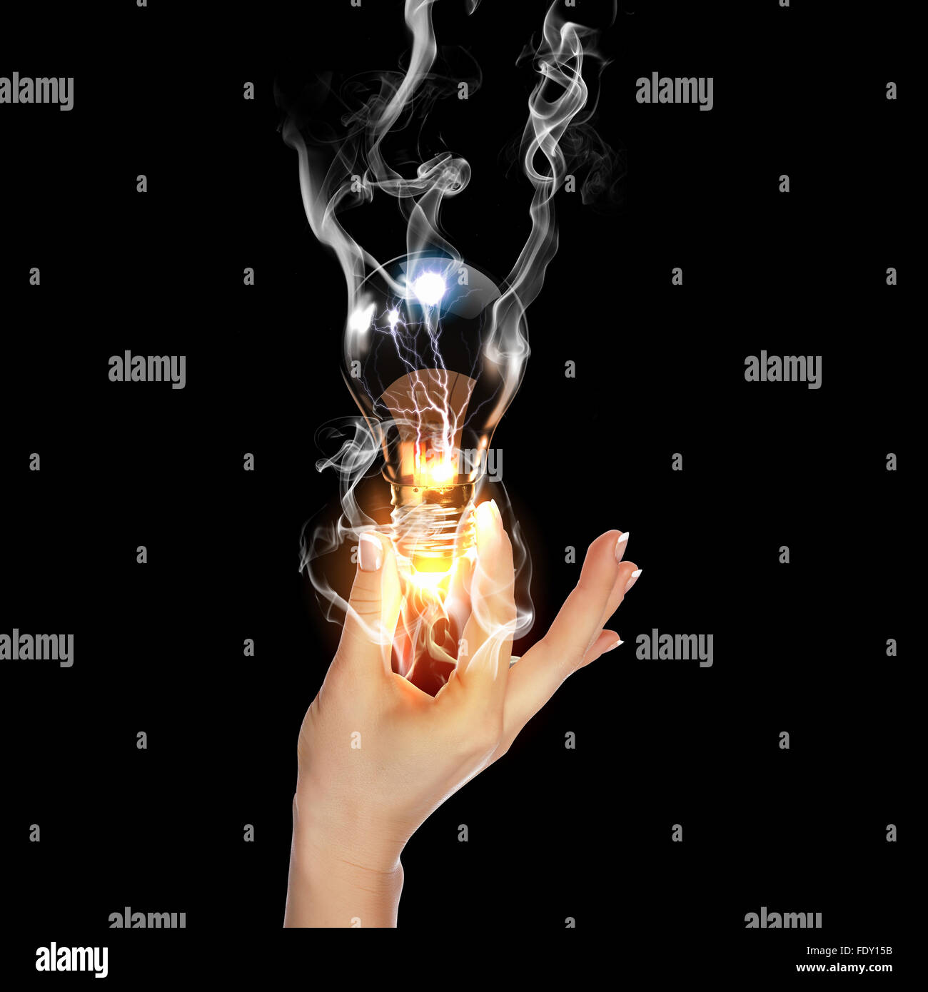 human hand, electric charge and light bulb Stock Photo - Alamy