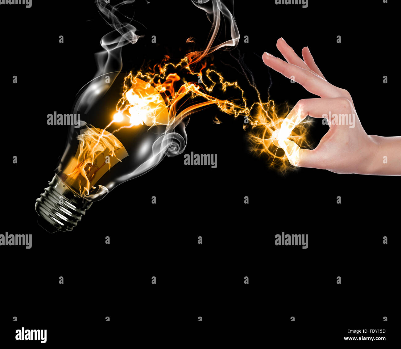 human hand, electric charge and light bulb Stock Photo - Alamy