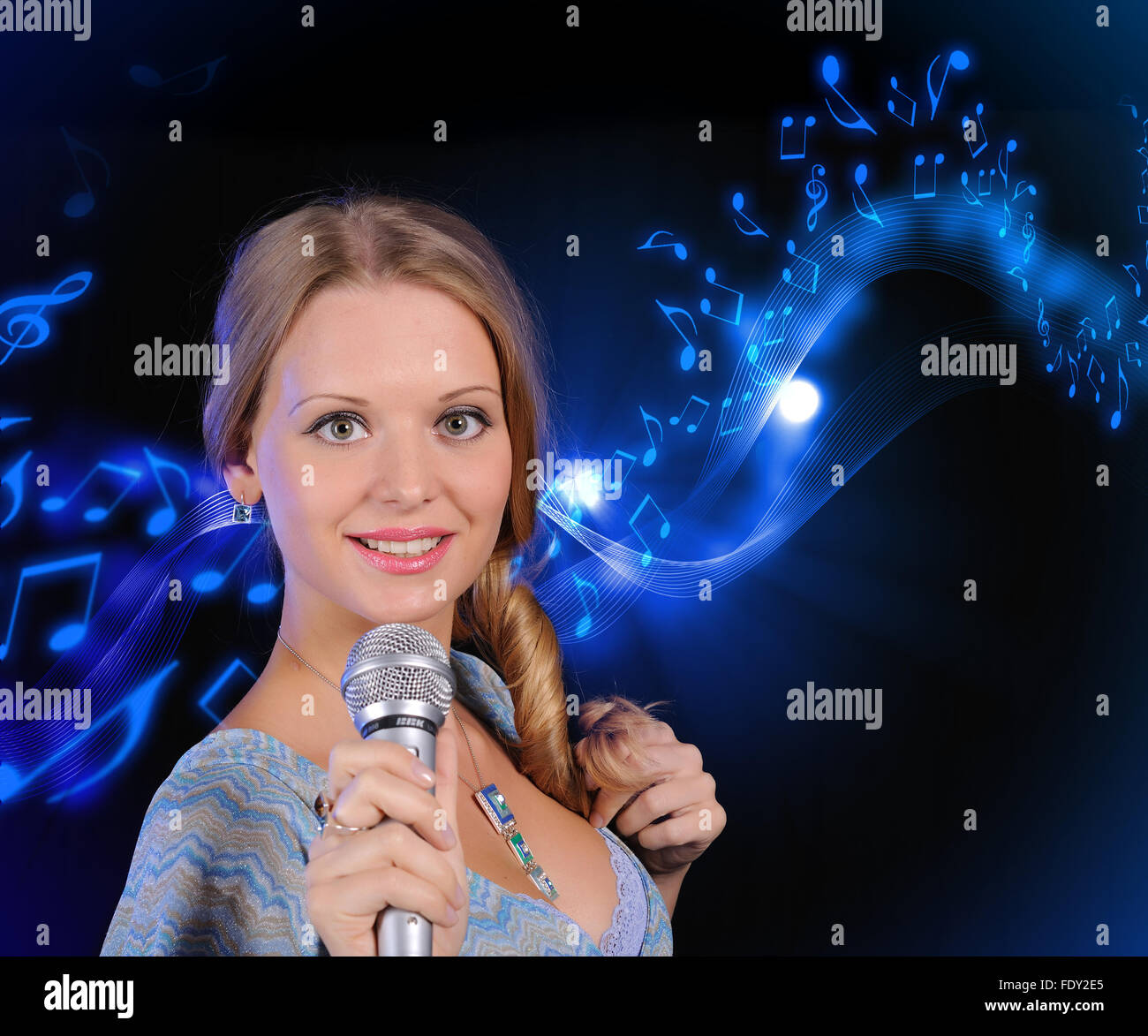 portrait of a young girl with a microphone Stock Photo - Alamy