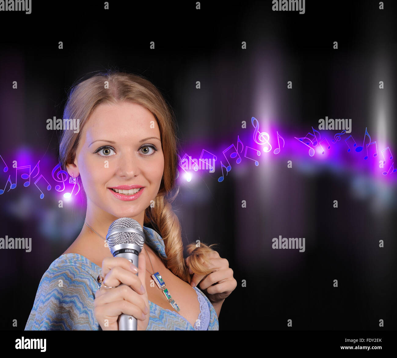 portrait of a young girl with a microphone Stock Photo - Alamy