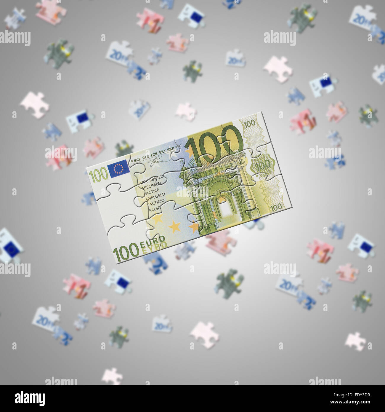 Puzzle of the euro banknotes and hands which it is collected. Symbol of ...