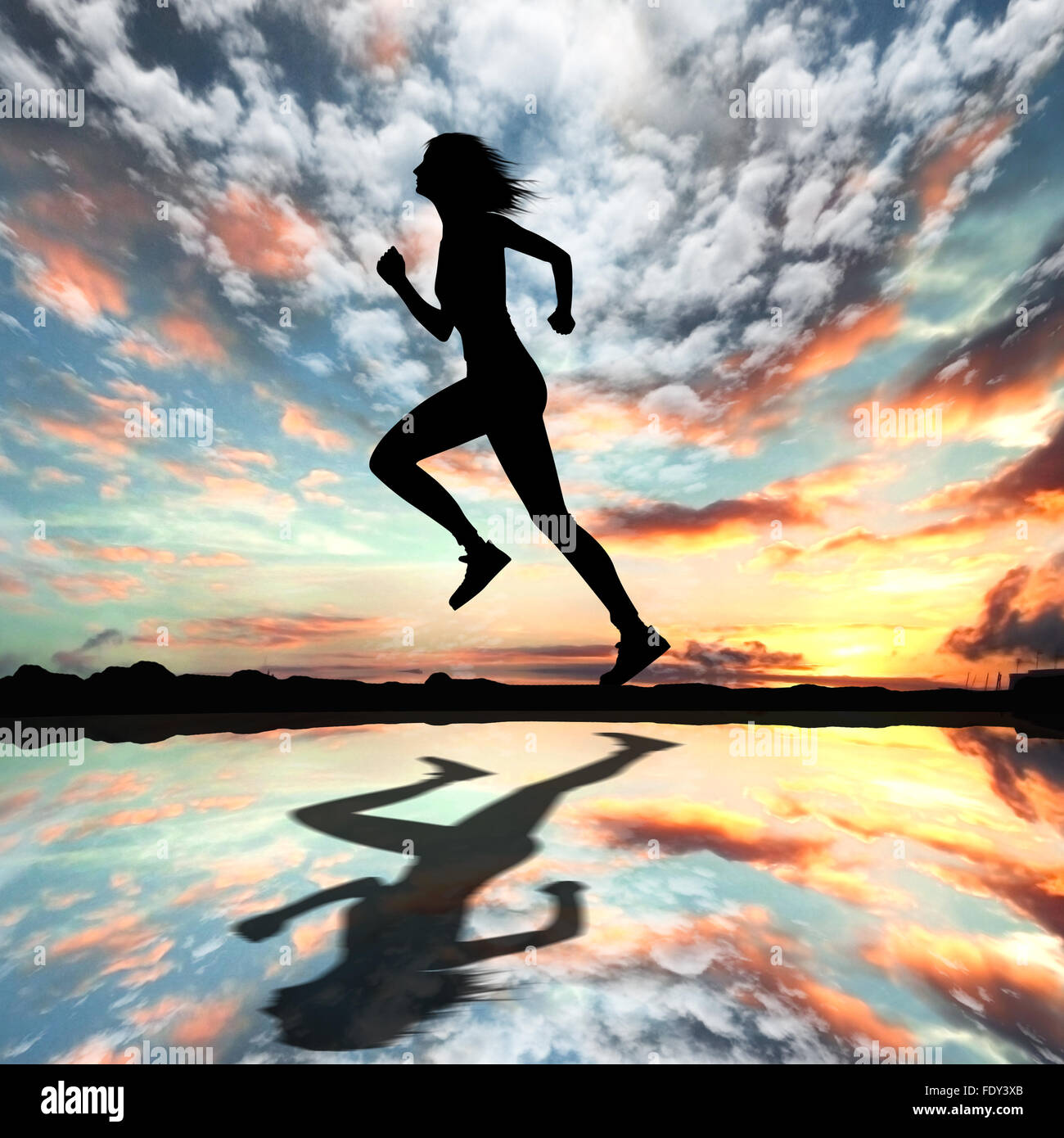 Silhouette of a man running against the evening sky Stock Photo - Alamy