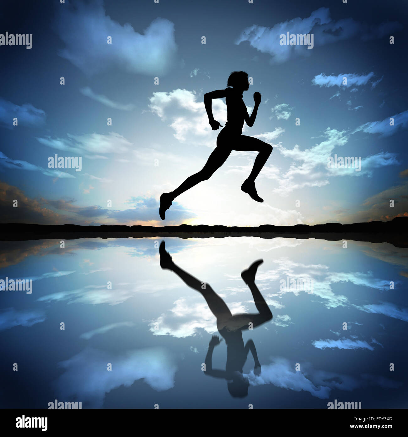 Silhouette of a man running against the evening sky Stock Photo - Alamy