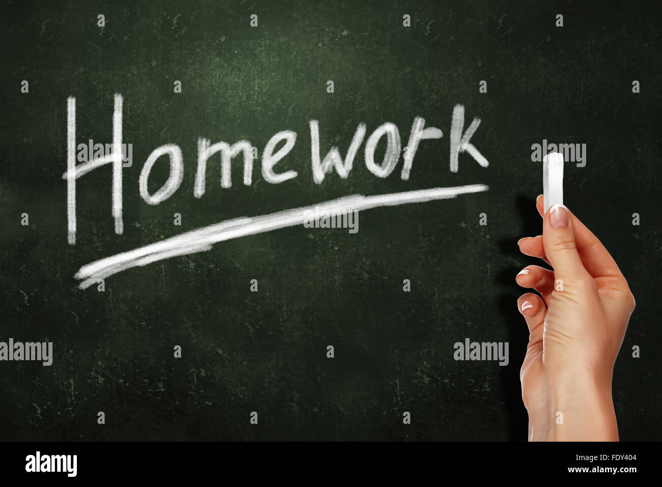 School board with the word homework written on it Stock Photo - Alamy