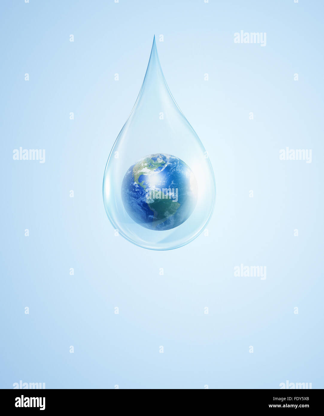 A large drop of water with Earth inside on a blue background. As a ...