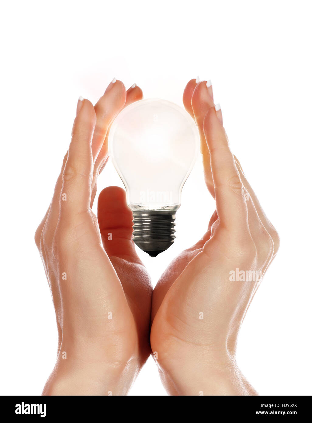 A lighting bulb between two hands on white background Stock Photo - Alamy