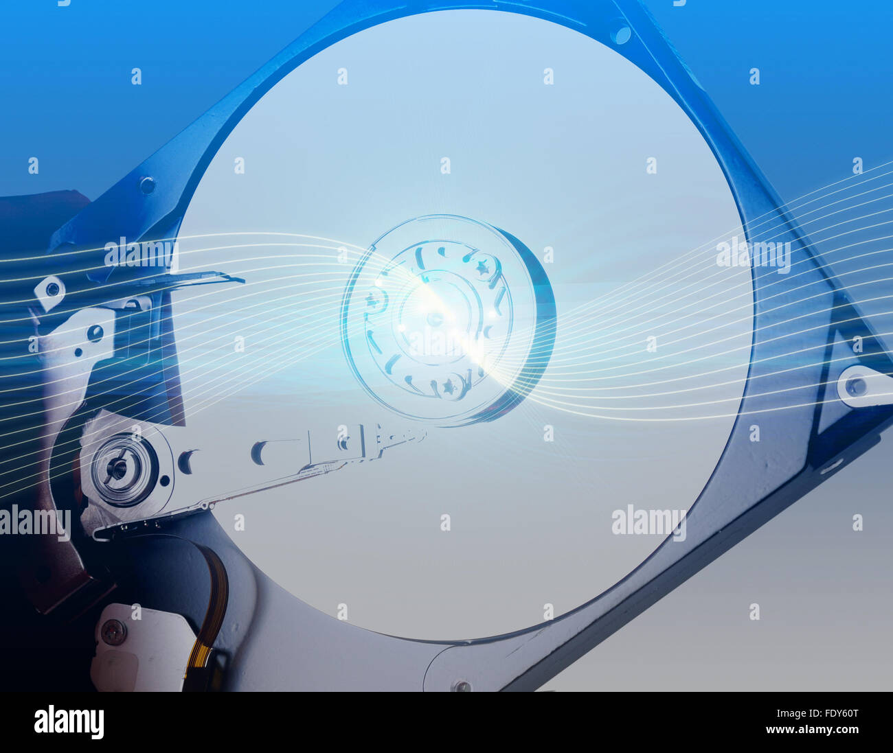 Hard disk drive with an abstract blue background Stock Photo - Alamy