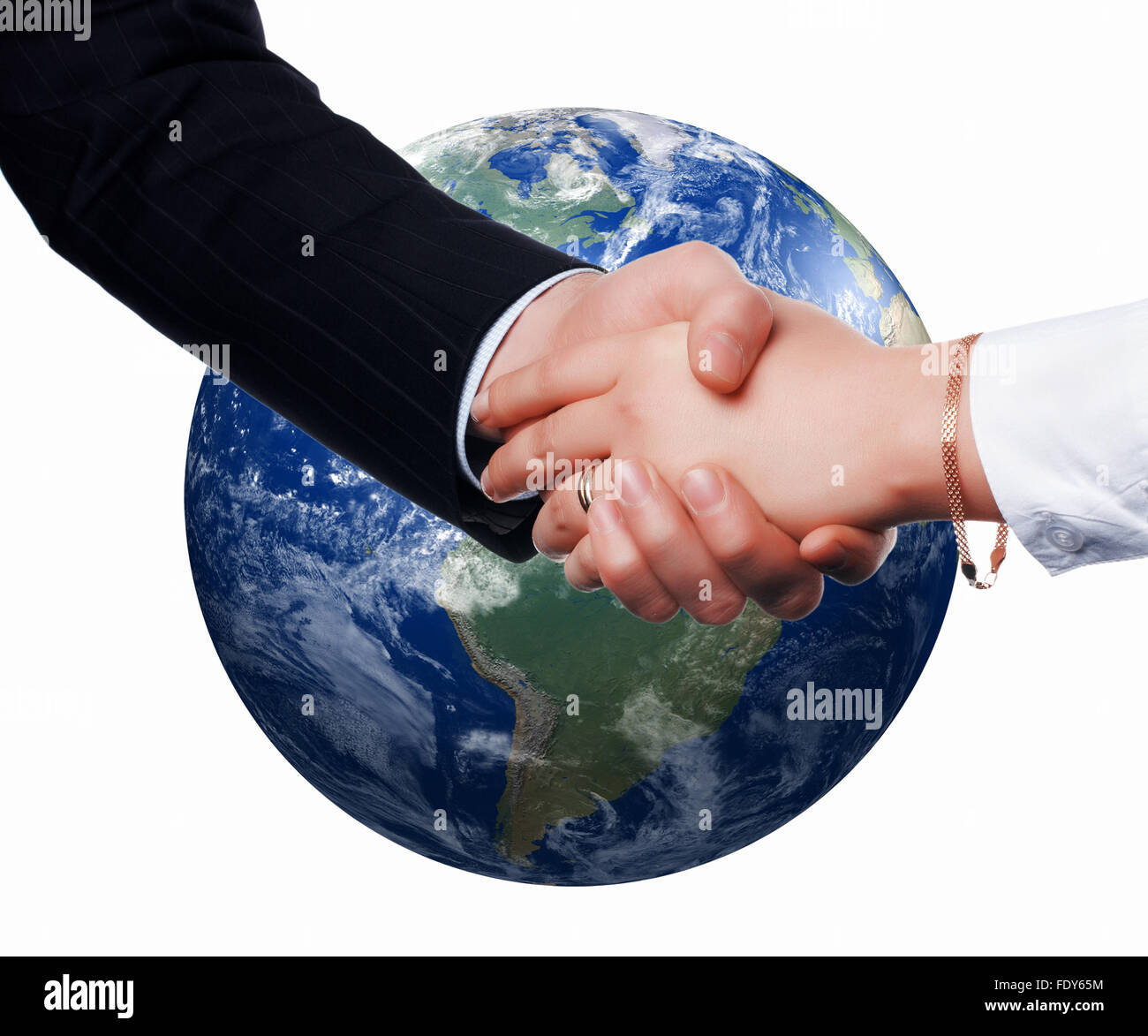 Business handshake on the background of the Earth. The symbol of a ...