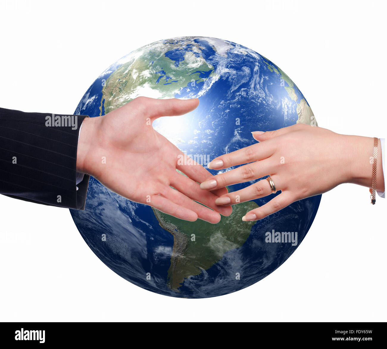 Business handshake on the background of the Earth. The symbol of a ...