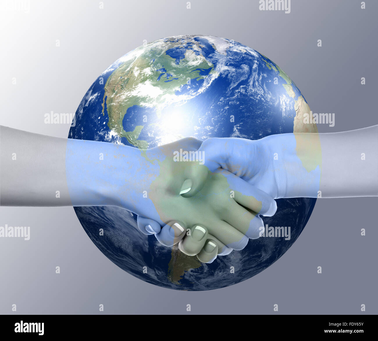 Business handshake on the background of the Earth. The symbol of a ...
