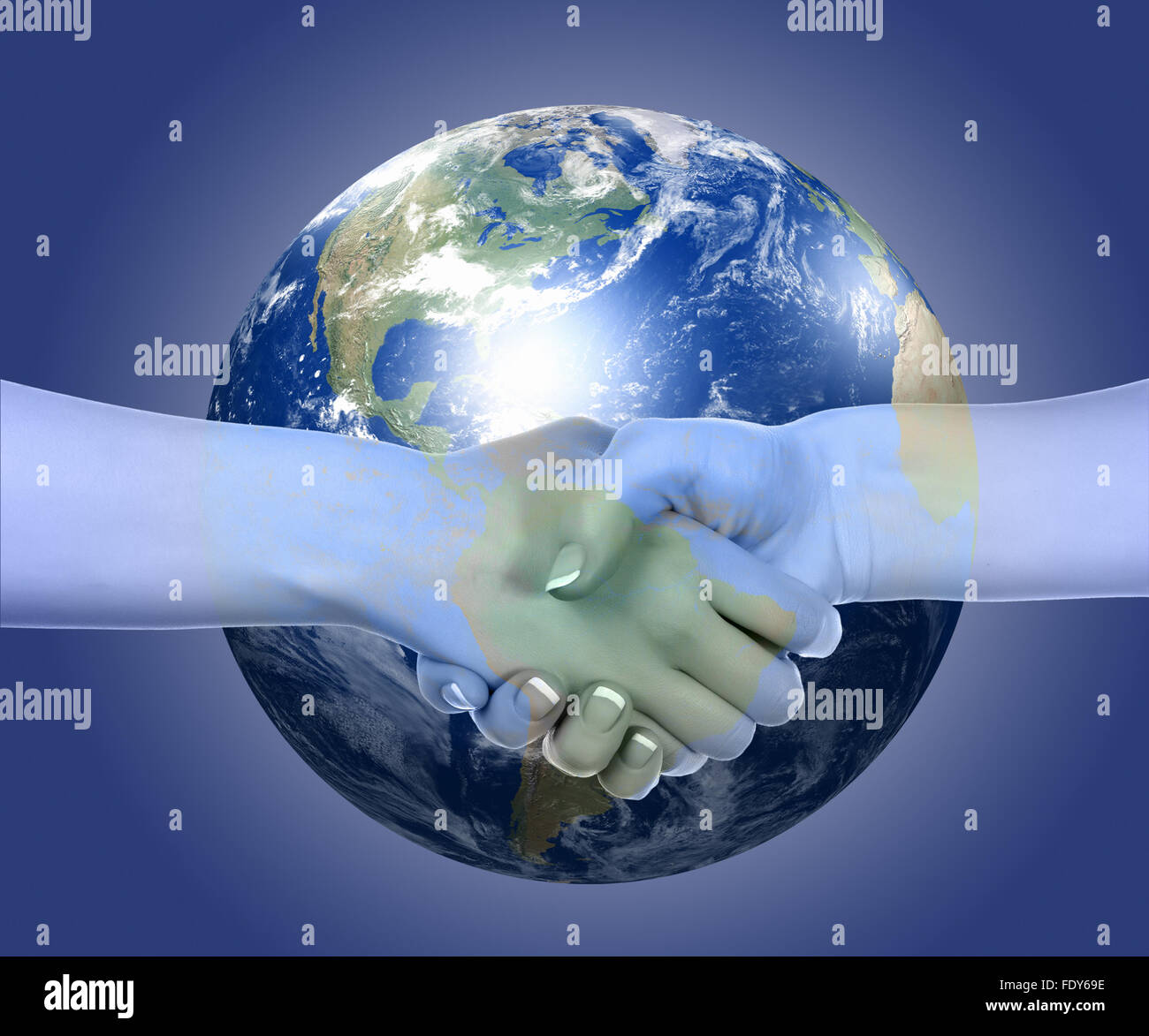Business handshake on the background of the Earth. The symbol of a ...