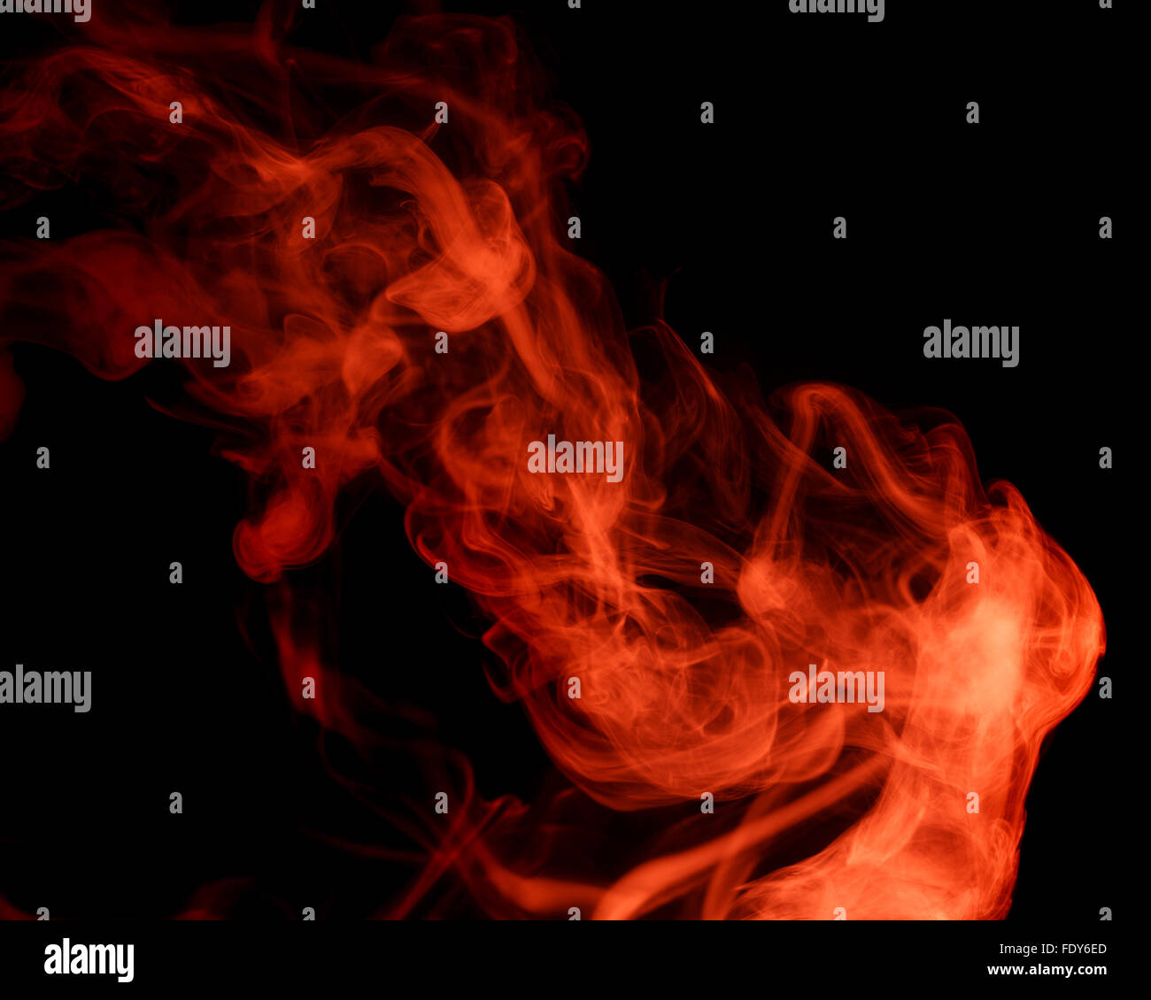 Abstract art. Red smoke hookah on a black background. Inhalation. The ...