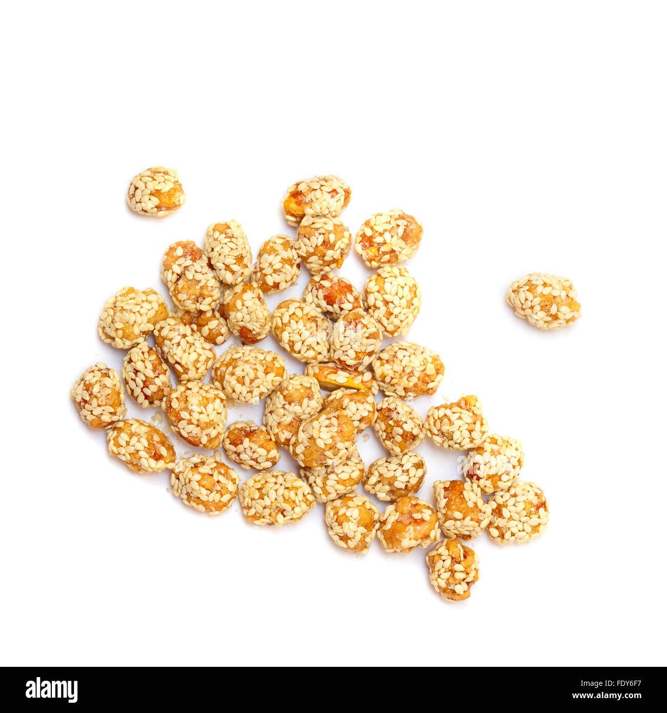 Nuts in honey and sesame. Roasted peanuts, breaded. Sugary snacks and ...