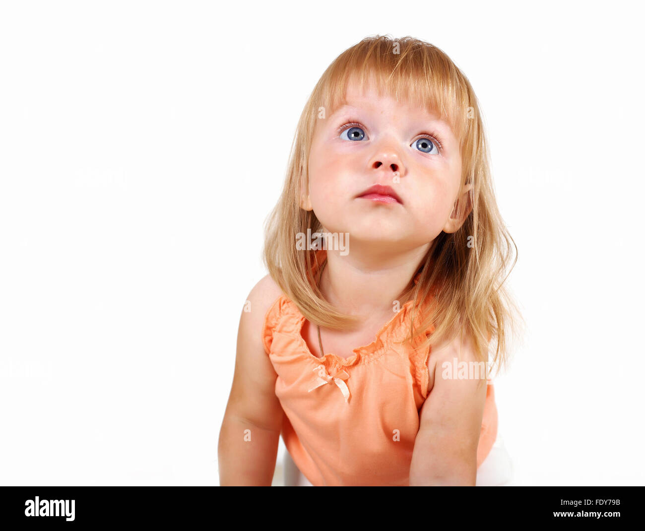 Portrait of a little blond girl in studio Stock Photo - Alamy