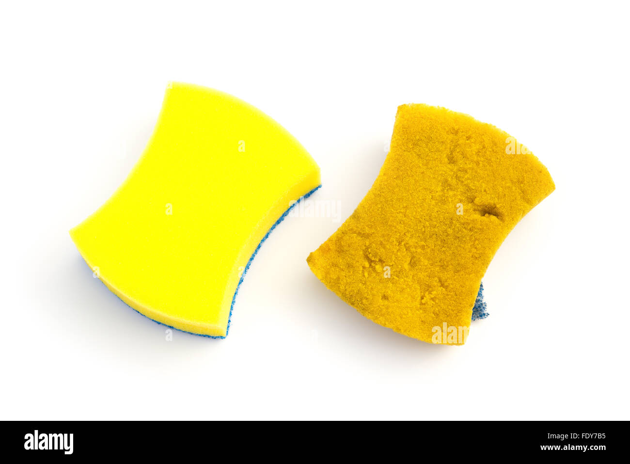 top view new & old double-side cleaning sponge on a white background ...