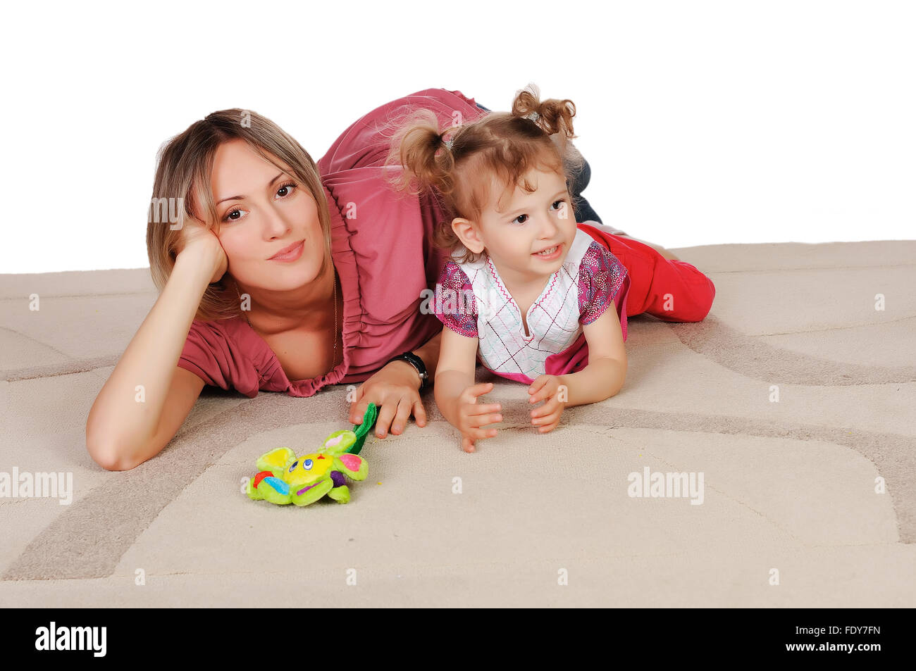 Young charming mother and her young daughter spent time together Stock ... Young charming mother and her young daughter spent time together Stock ...