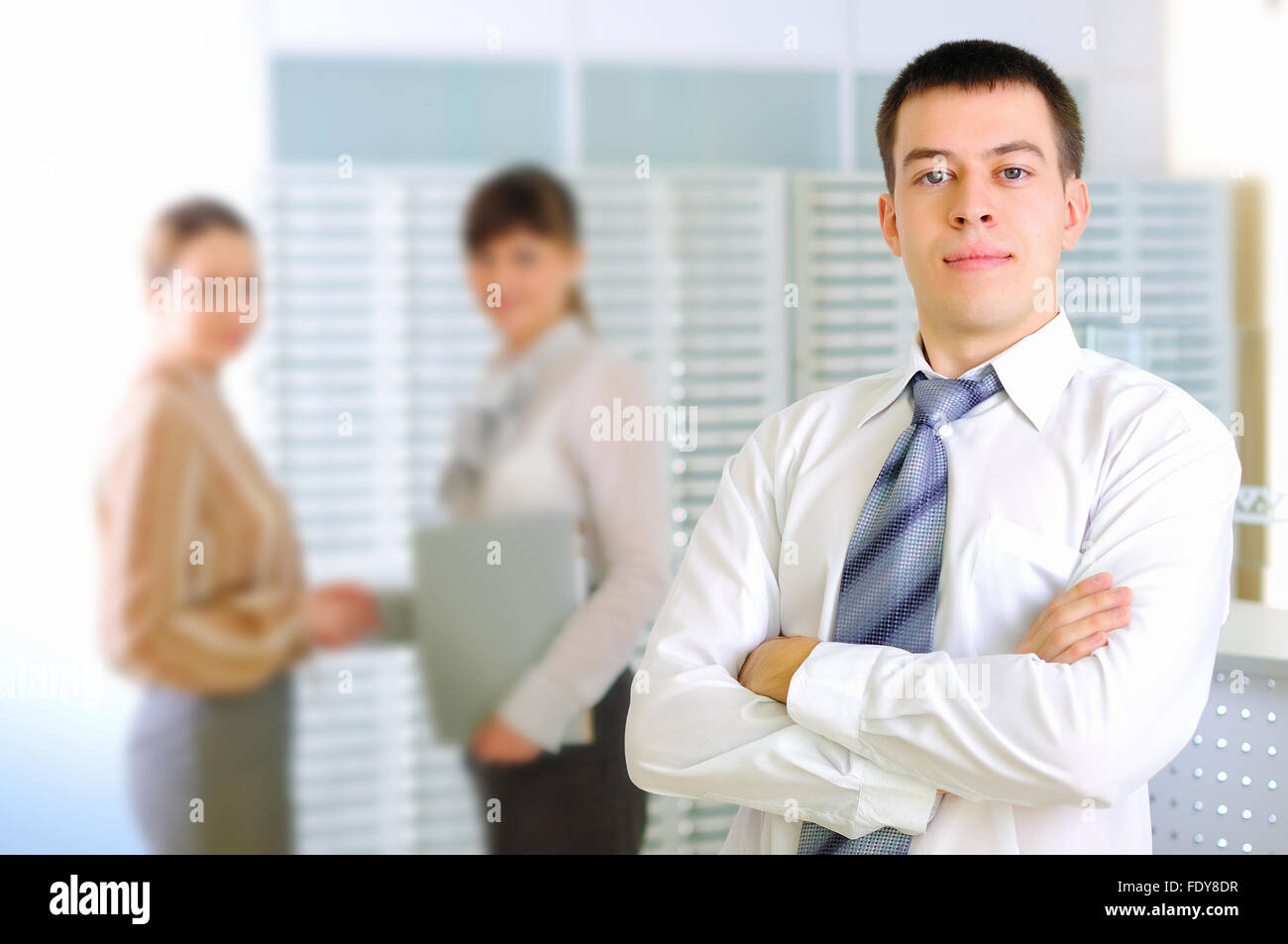 Young business man in the office workplace Stock Photo - Alamy