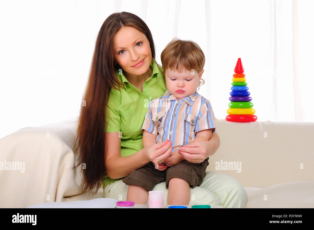 Mom and son having fun together. Symbol of the family Stock Photo - Alamy
