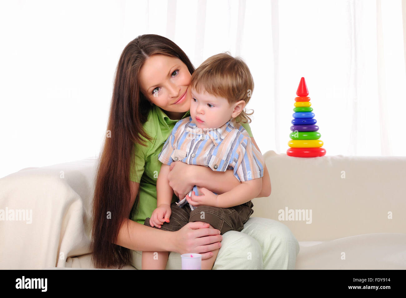 Mom and son having fun together. Symbol of the family Stock Photo - Alamy