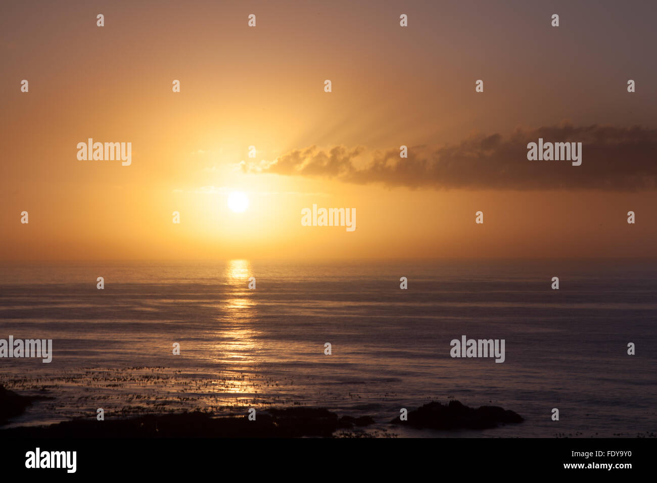 generic sunset over the Atlantic Ocean Stock Photo - Alamy