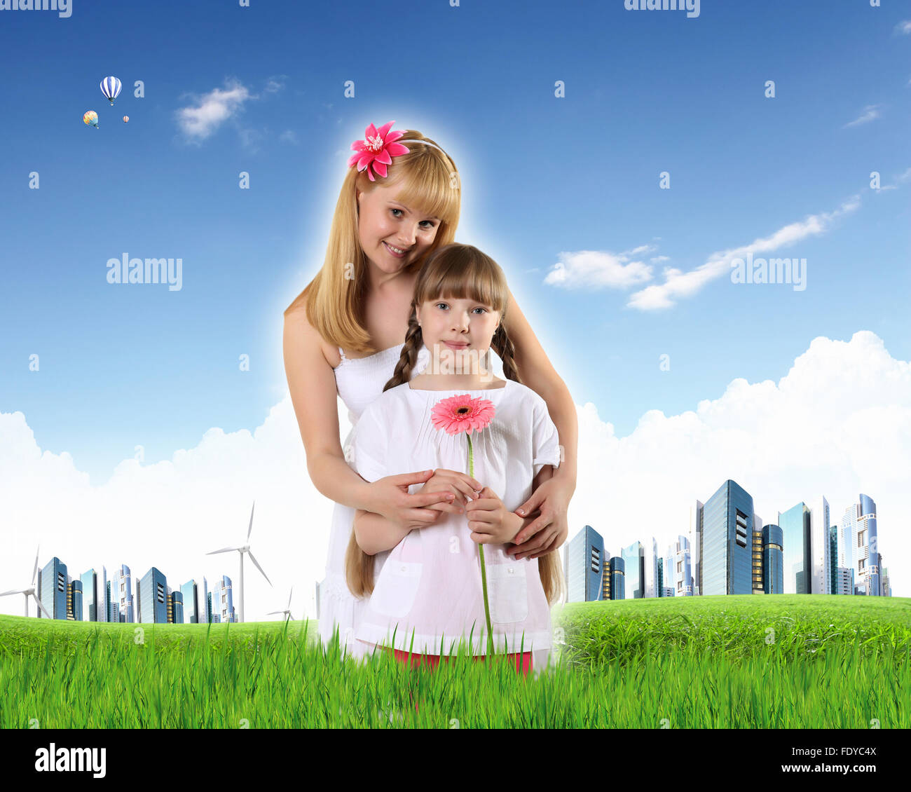 Collage with children and parents on green grass and under blue sky ...