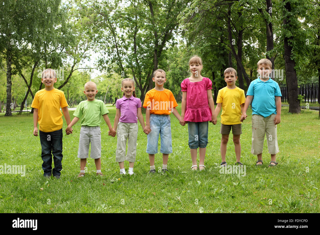 Group of children having fun together in the park Stock Photo - Alamy