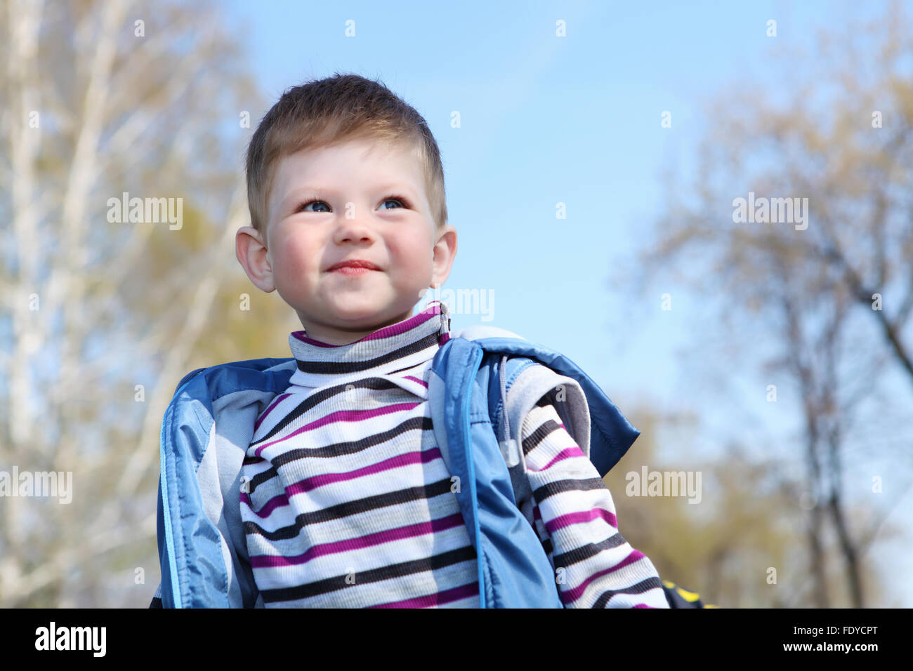 portrait of little boy in spring park Stock Photo - Alamy