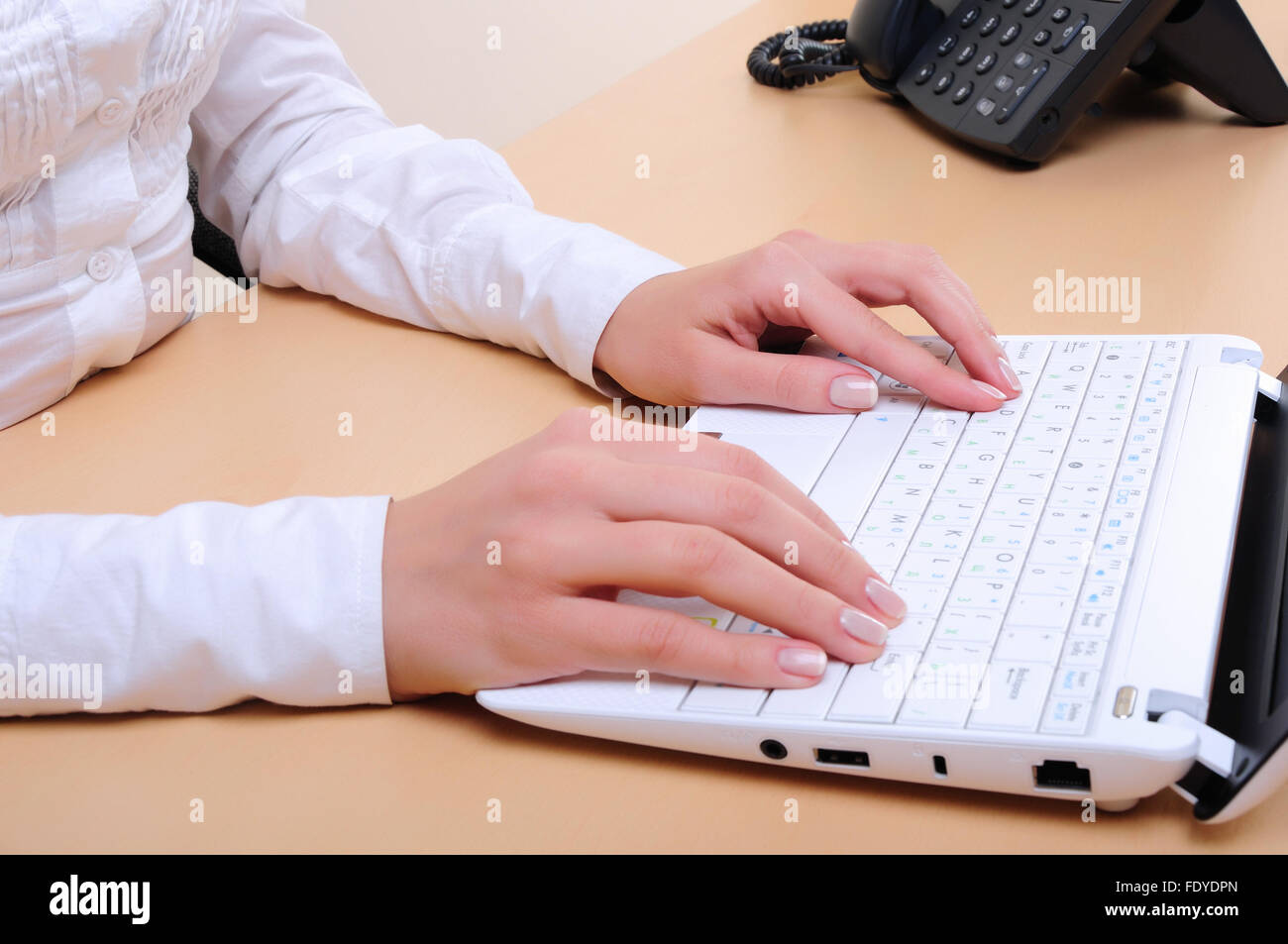Hands of a young girl running on a computer in the office Stock Photo ...