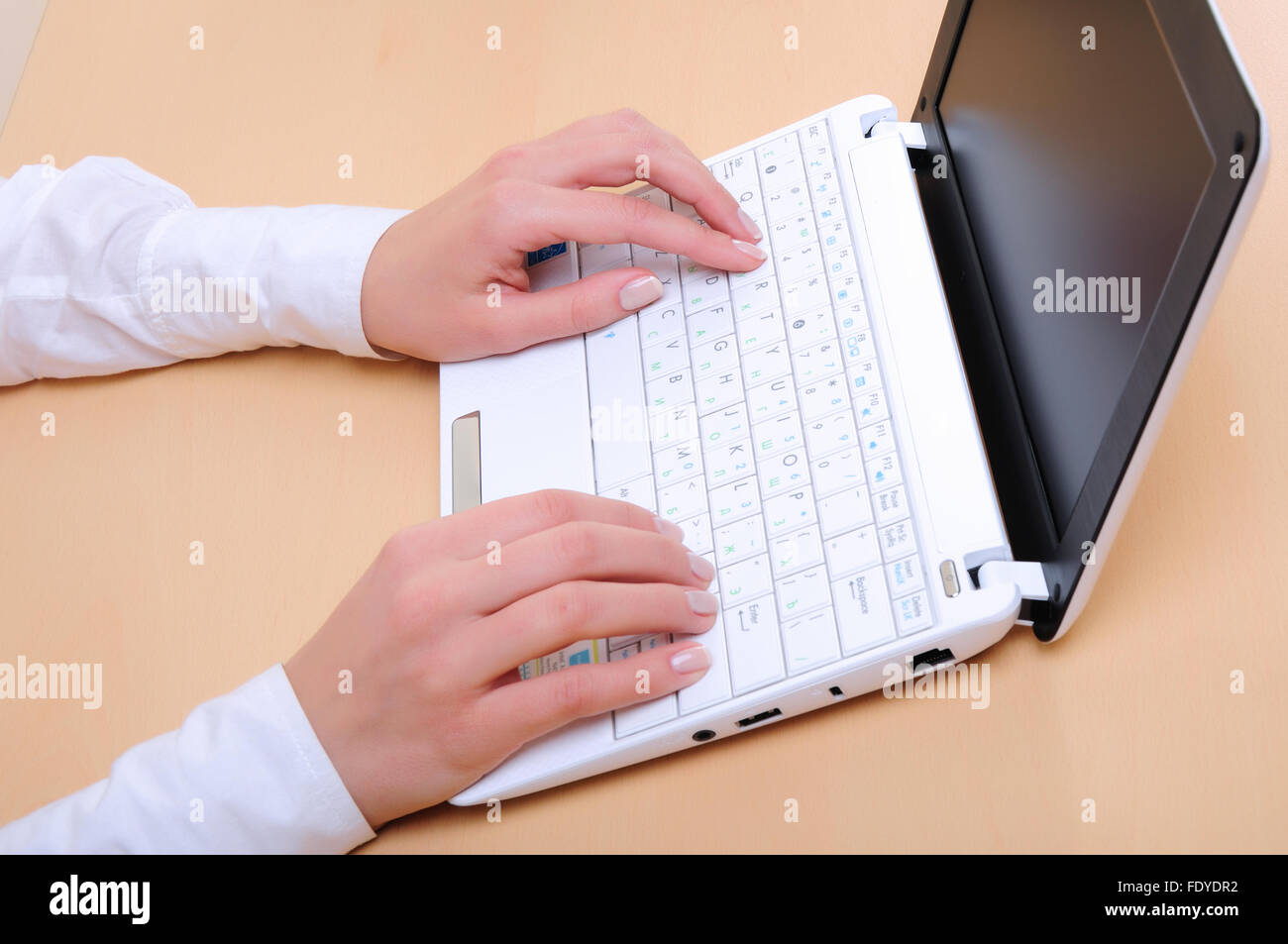 Hands of a young girl running on a computer in the office Stock Photo ...