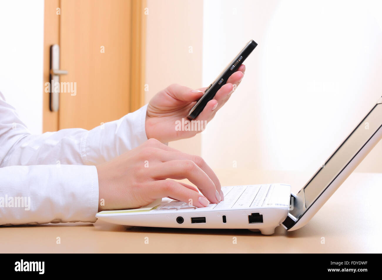Hands of a young girl running on a computer in the office Stock Photo ...