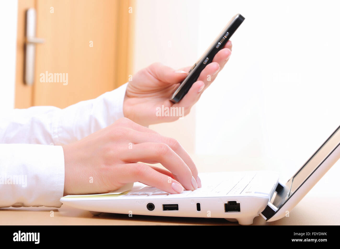 Hands of a young girl running on a computer in the office Stock Photo ...