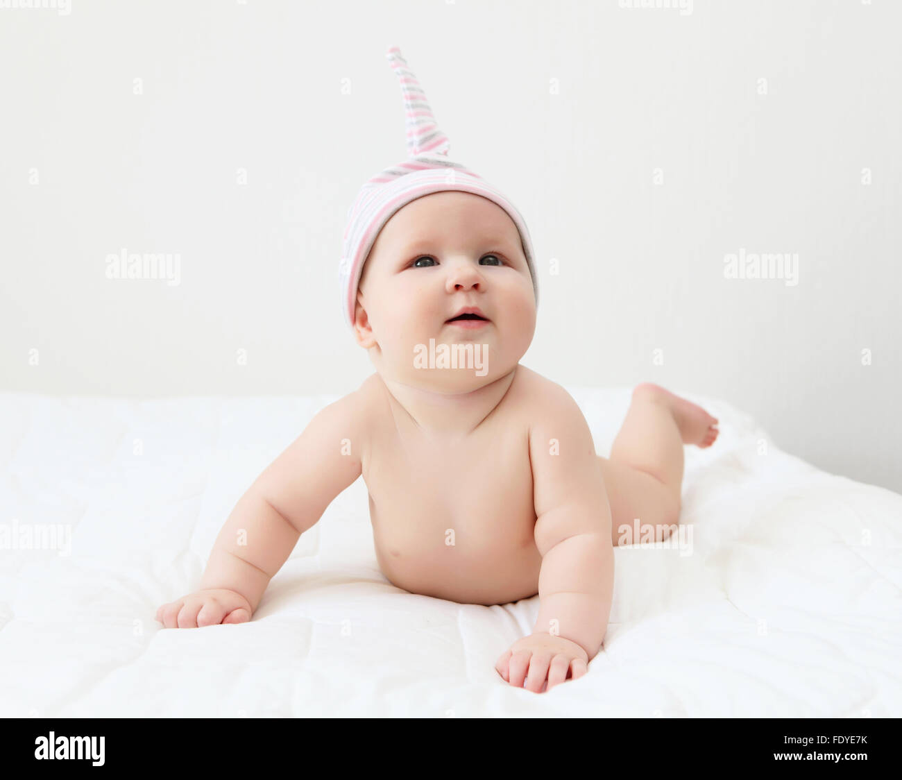 Portrait of a young child on a white background. Baby Stock Photo - Alamy