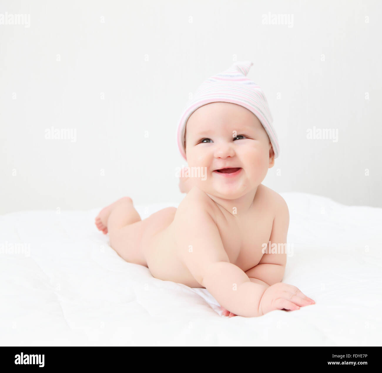Portrait of a young child on a white background. Baby Stock Photo - Alamy