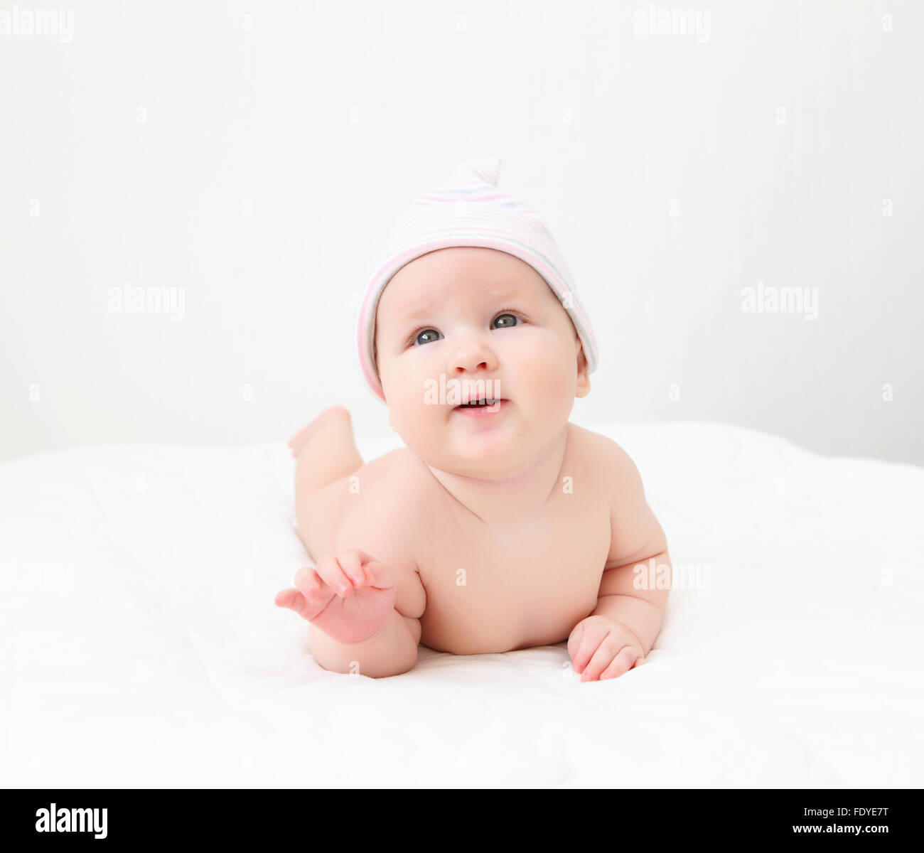 Portrait of a young child on a white background. Baby Stock Photo - Alamy