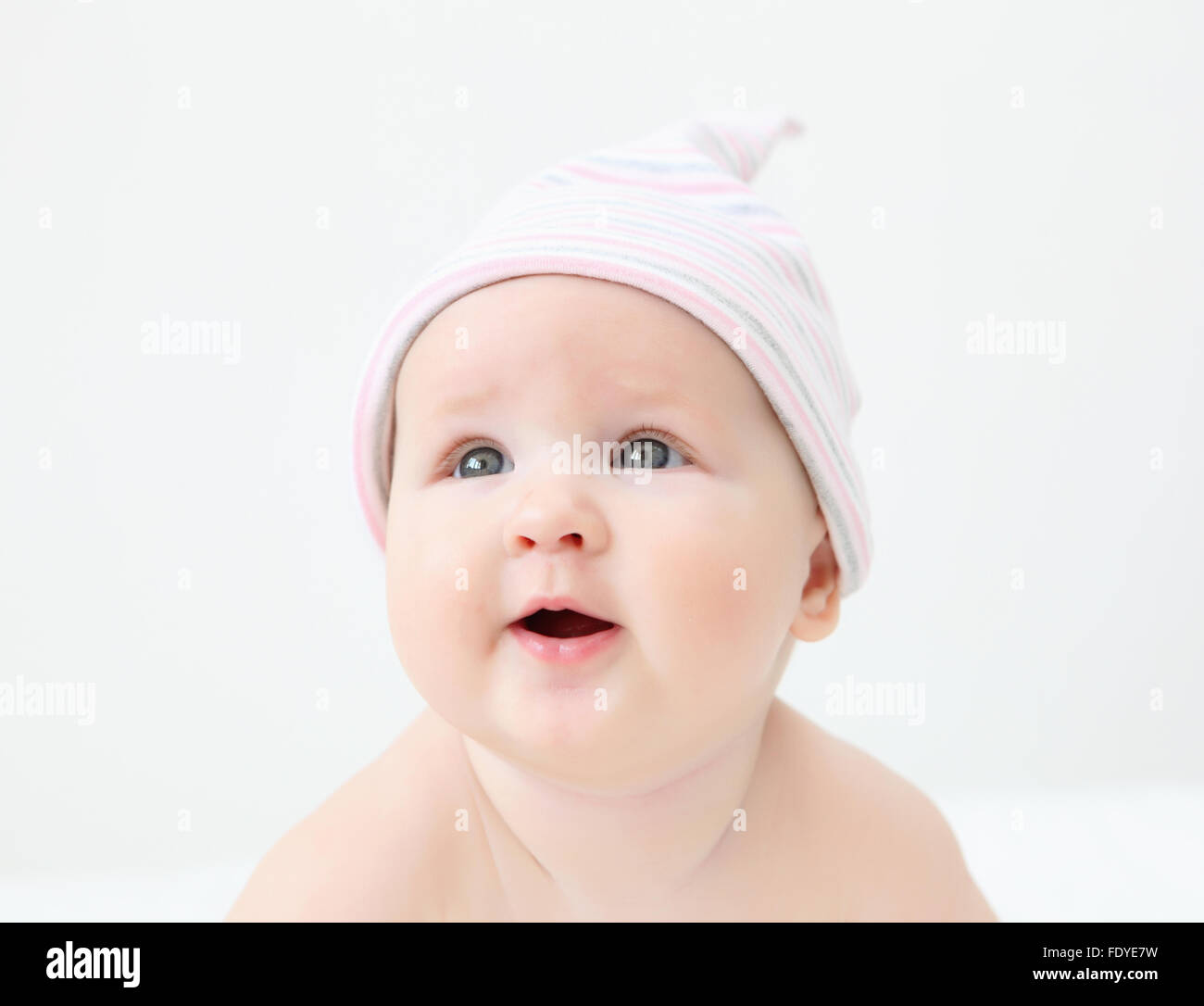 Portrait of a young child on a white background. Baby Stock Photo - Alamy