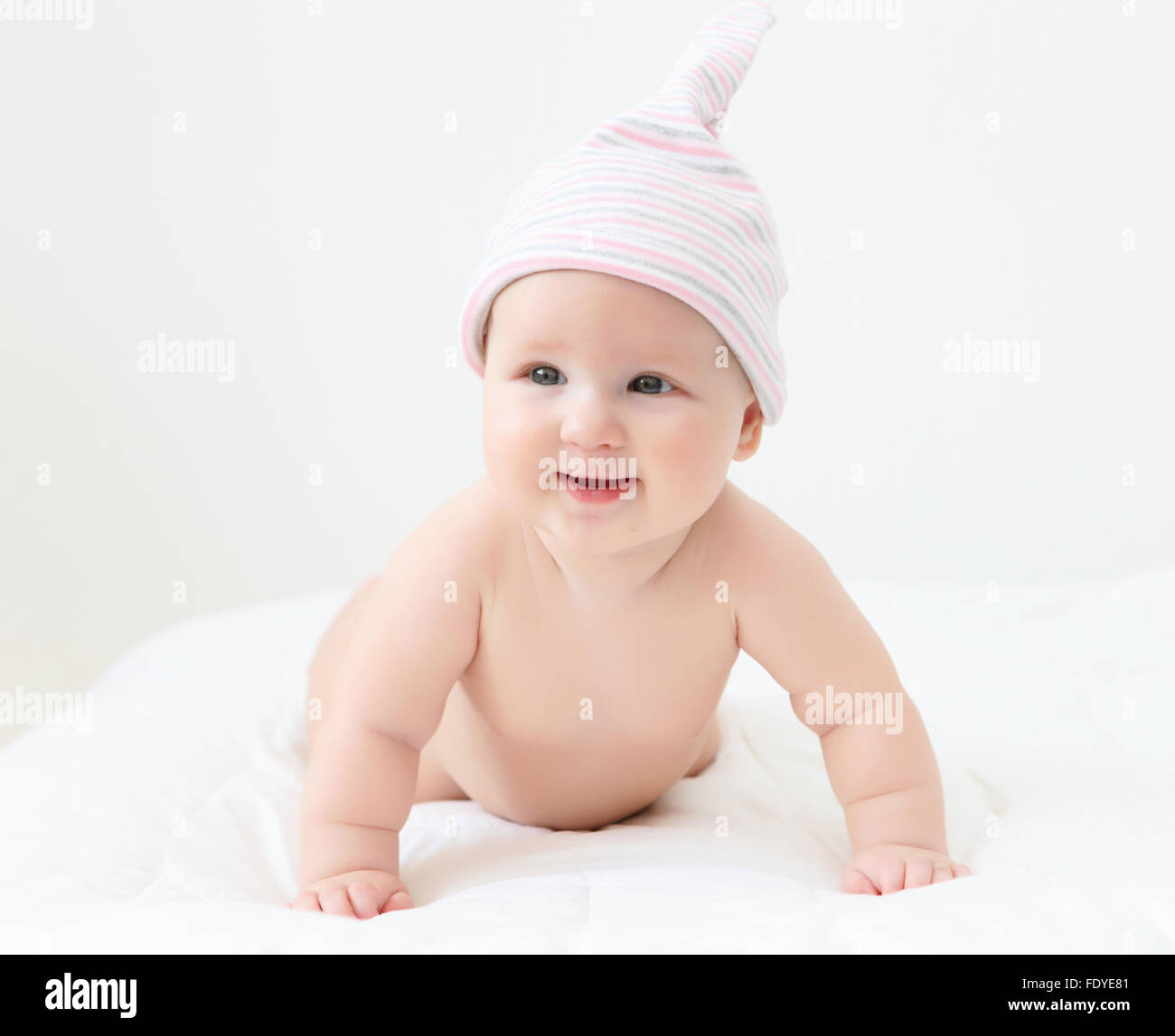 Portrait of a young child on a white background. Baby Stock Photo - Alamy
