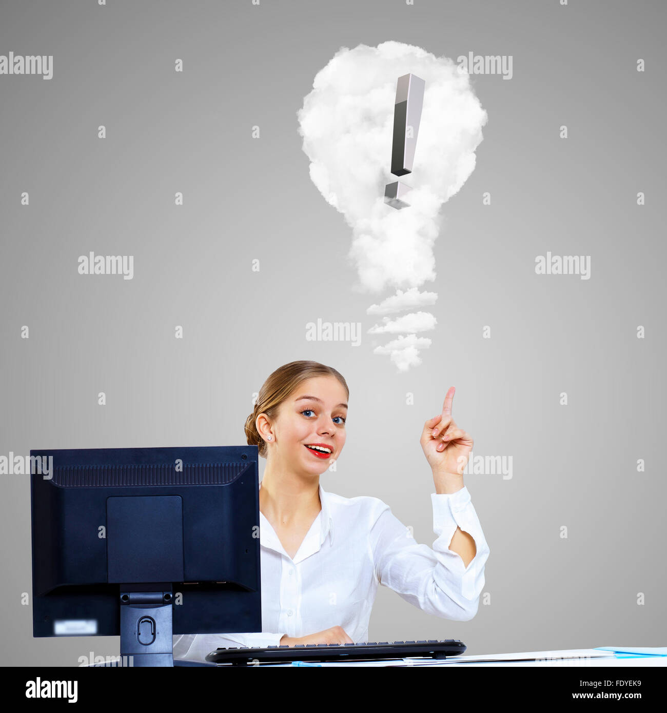 Young woman in business wear generating ideas in office Stock Photo - Alamy