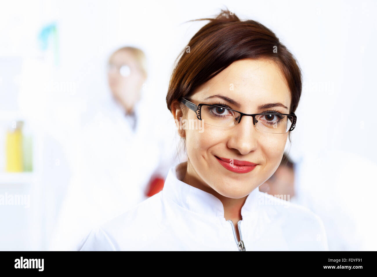 Scientist in uniform doing tests in laboratory Stock Photo - Alamy
