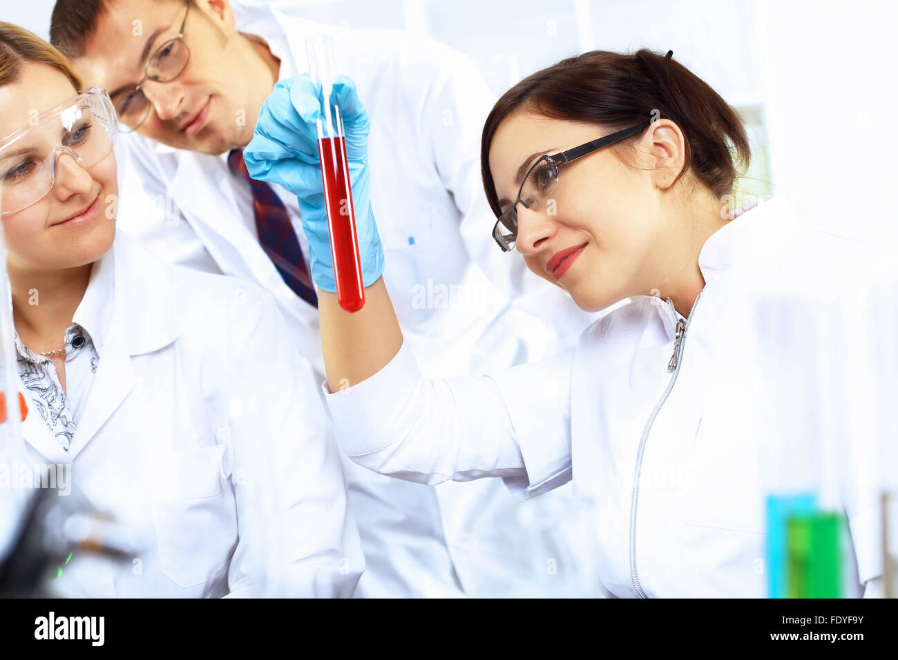 Scientist in uniform doing tests in laboratory Stock Photo - Alamy