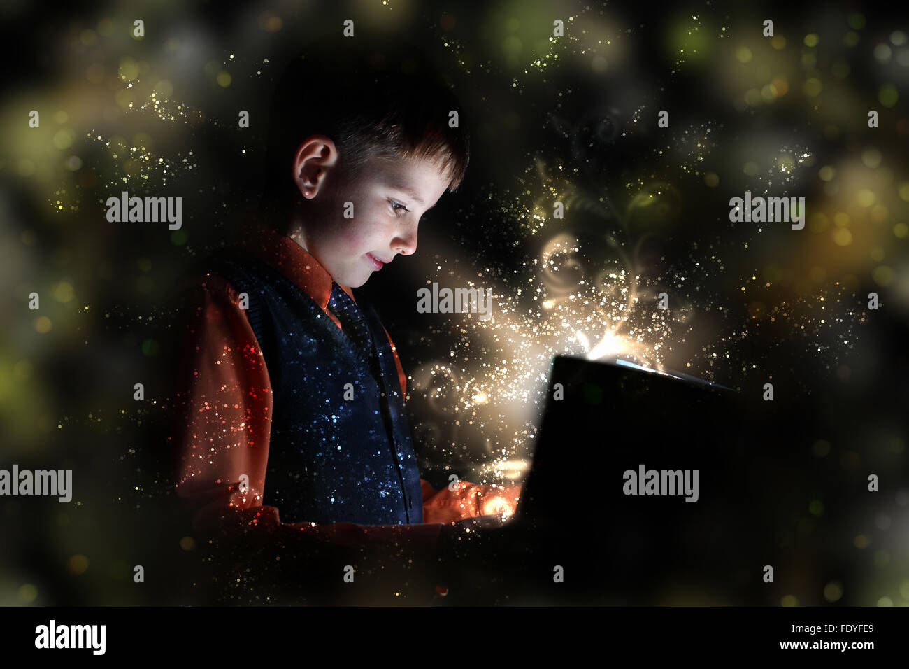Child opening a magic gift box with lights and shining around Stock ...