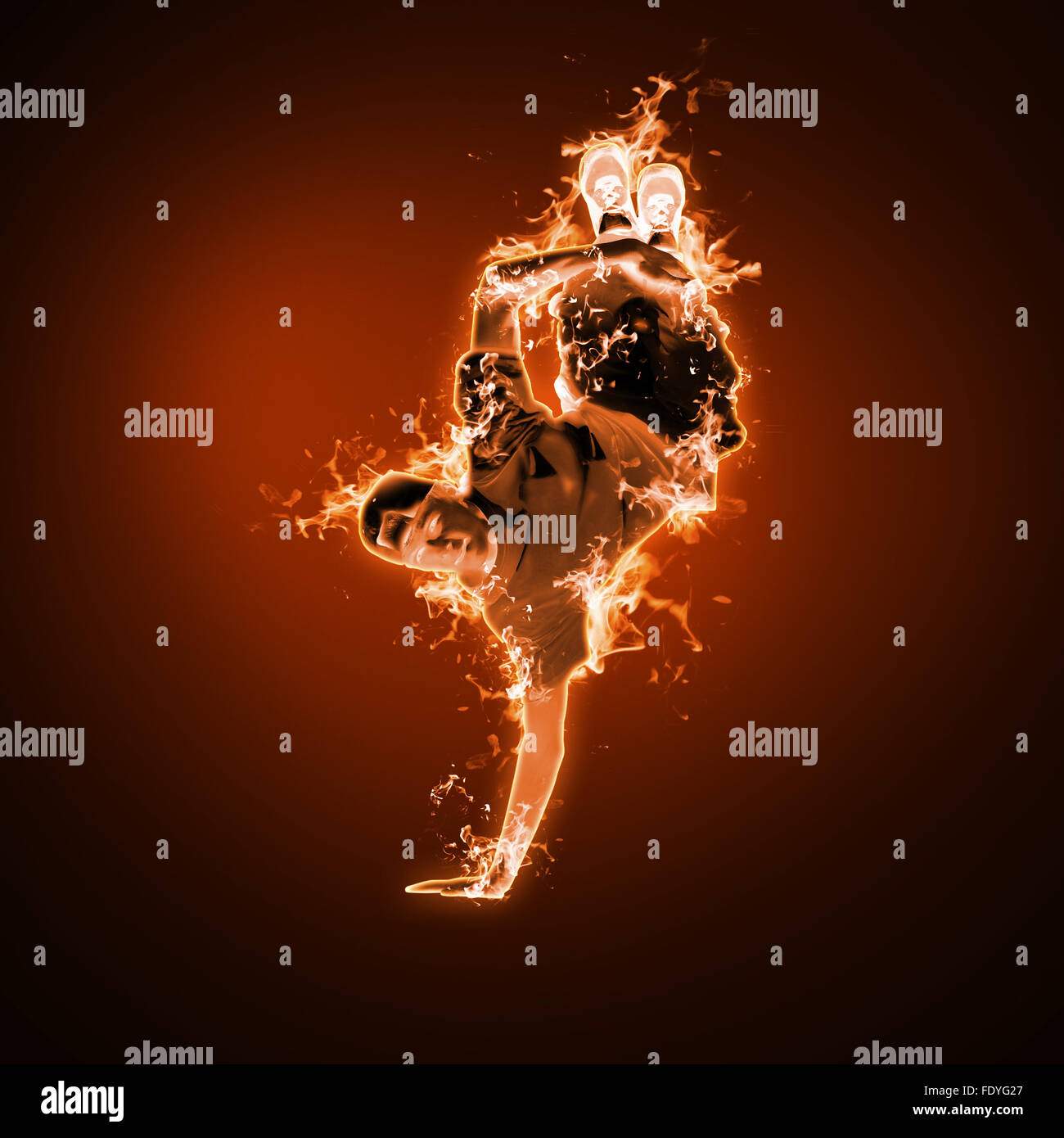 Flame and fire dancer against black background Stock Photo - Alamy