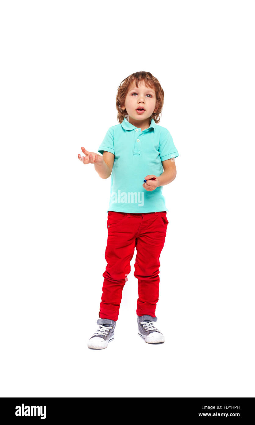 Cute little boy standing in isolation Stock Photo - Alamy