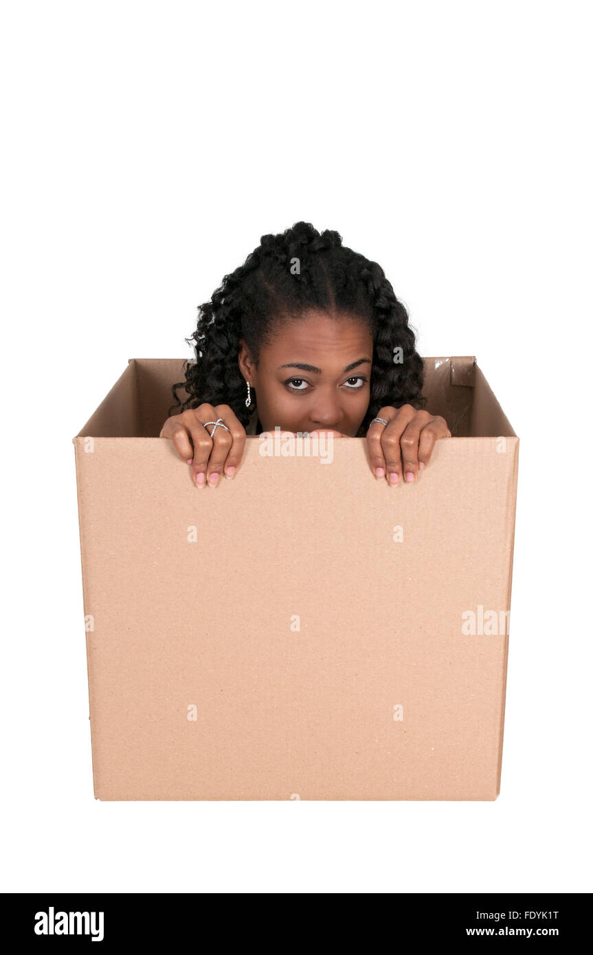 Beautiful black woman thinking while standing beside a box Stock Photo ...