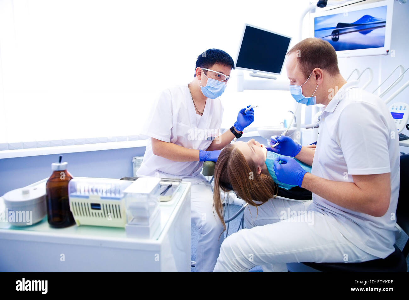 dentist treats teeth Stock Photo - Alamy