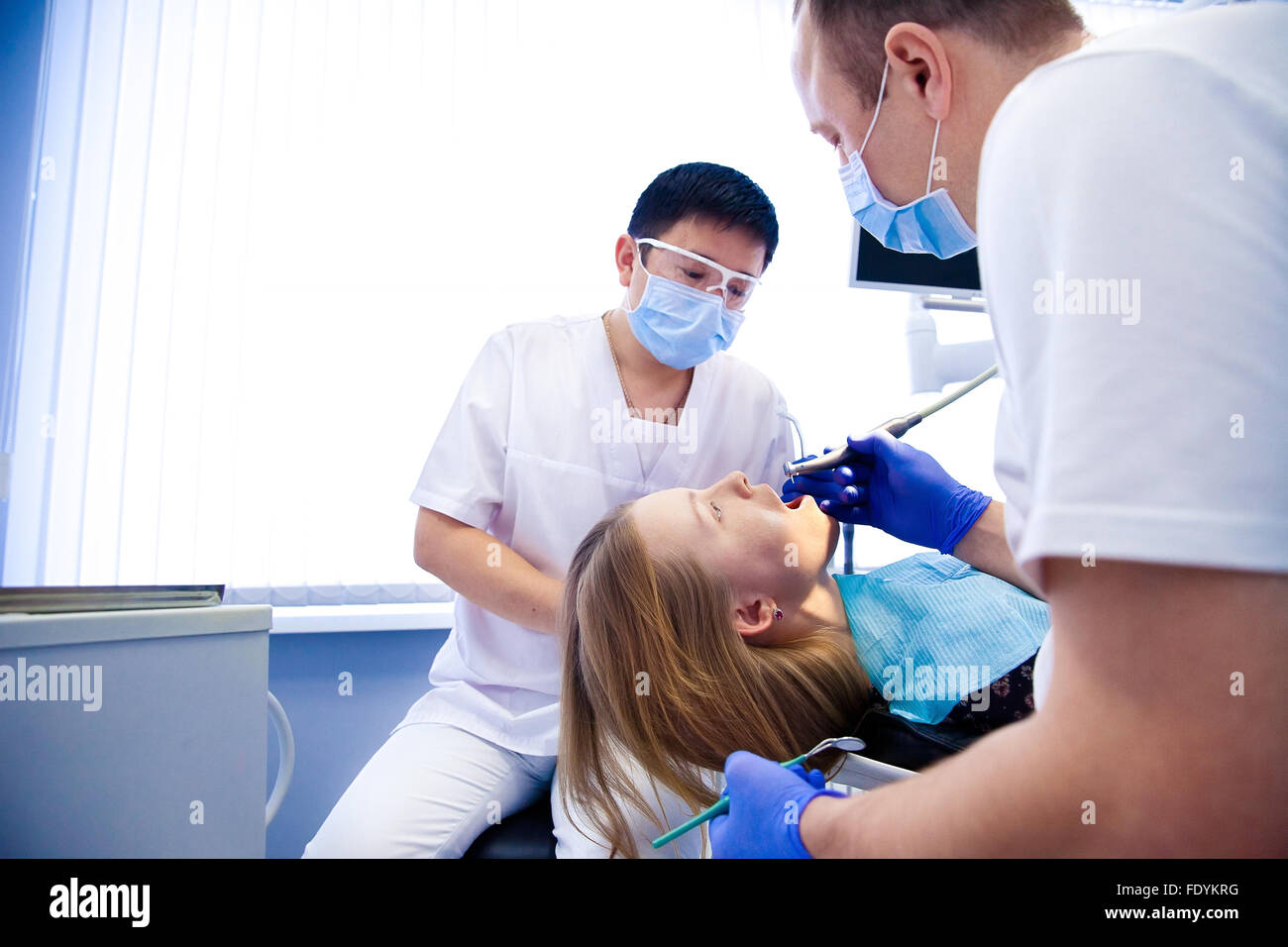 dentist treats teeth Stock Photo - Alamy